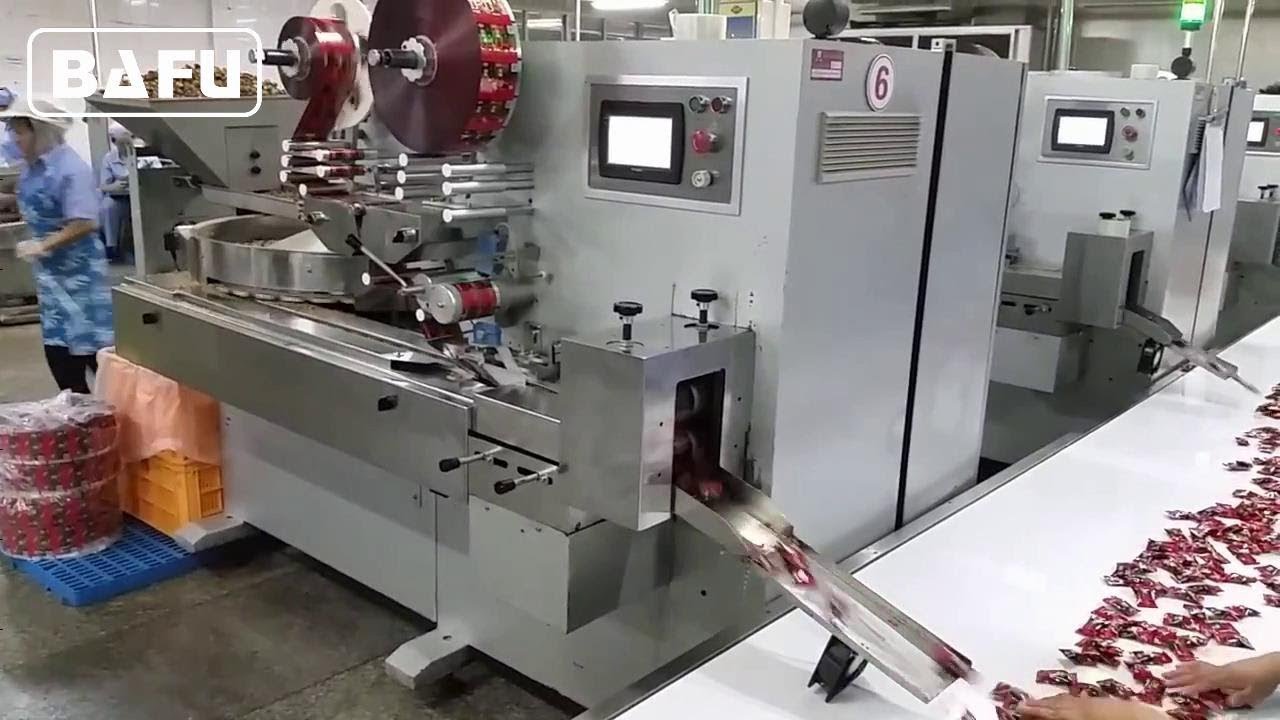high speed candy wrapping machine, candy packaging machine, confectionery wrapping machine - YouTube