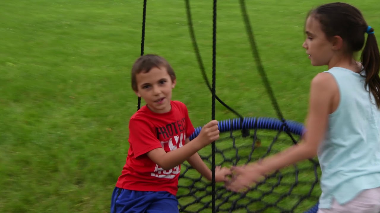 We put up a spider swing in the back yard. It soars! - YouTube
