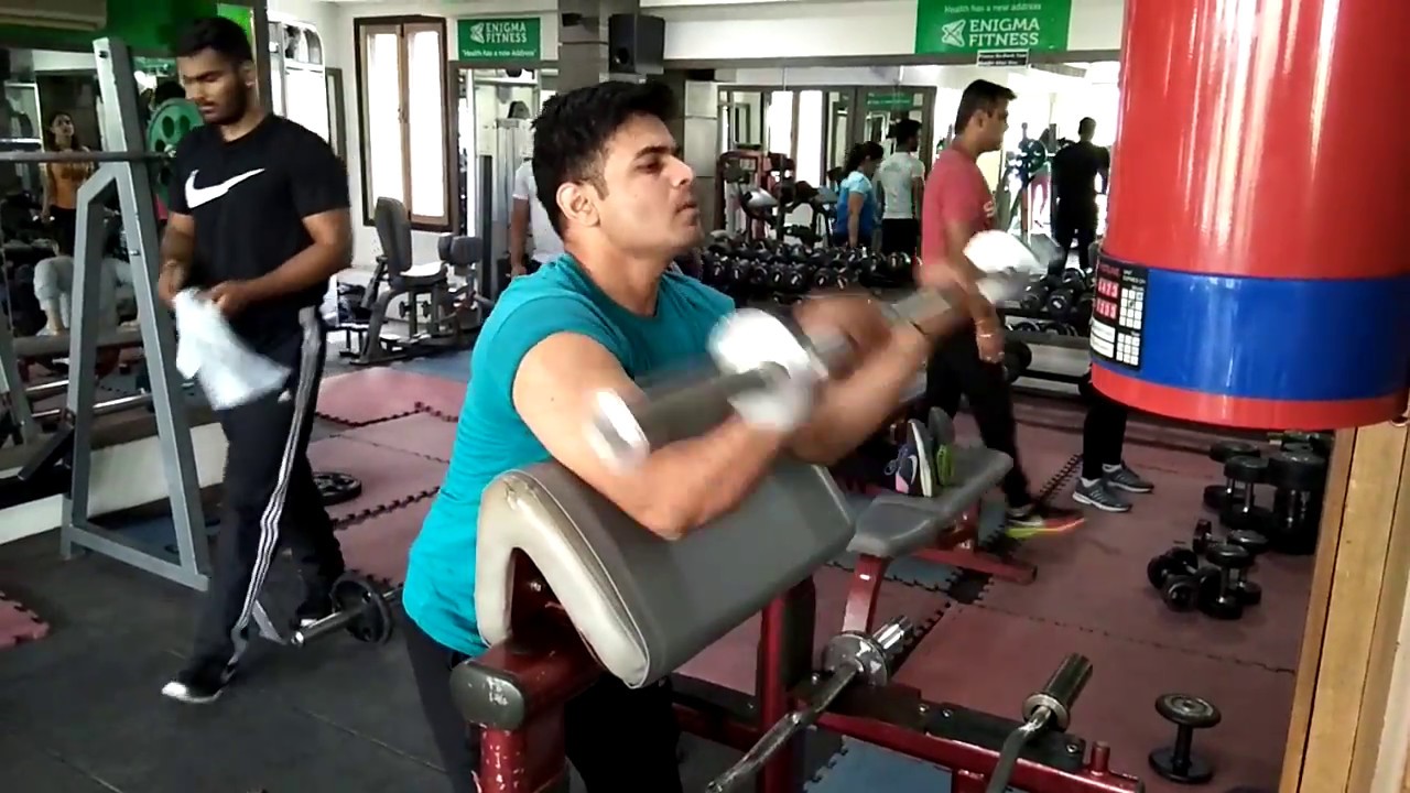 Prechar machine reverse barbel curl.. - YouTube