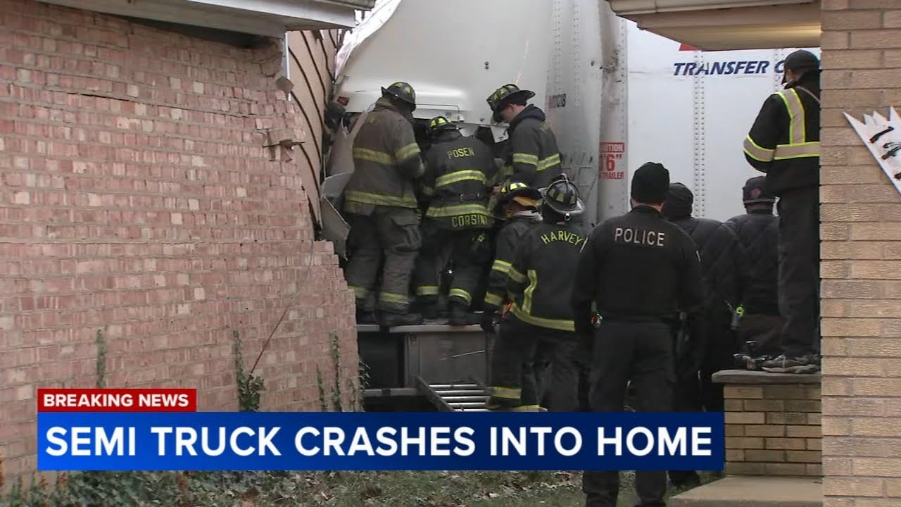 Semi crashes into abandoned house in south suburbs, officials say - YouTube