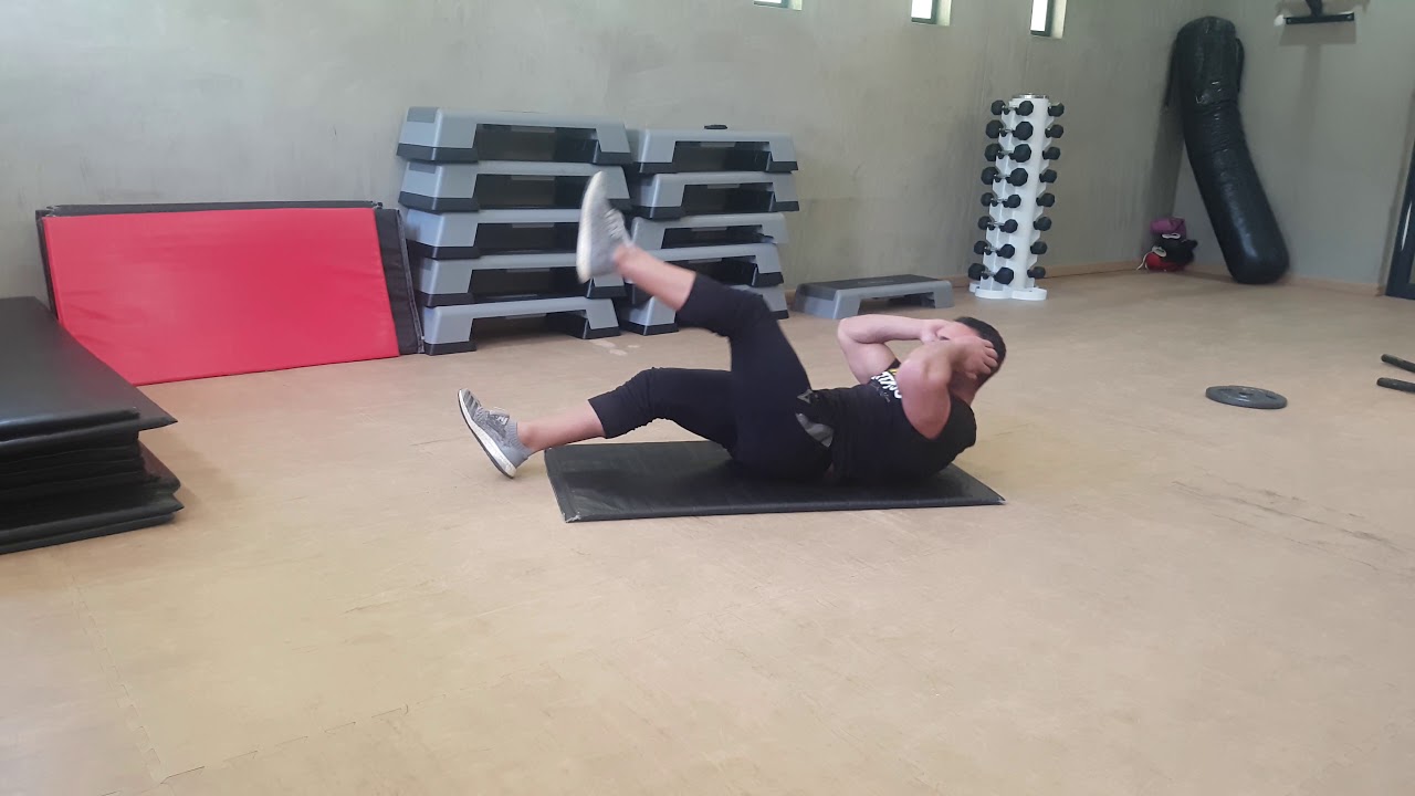 Unilateral knee in crunch - YouTube
