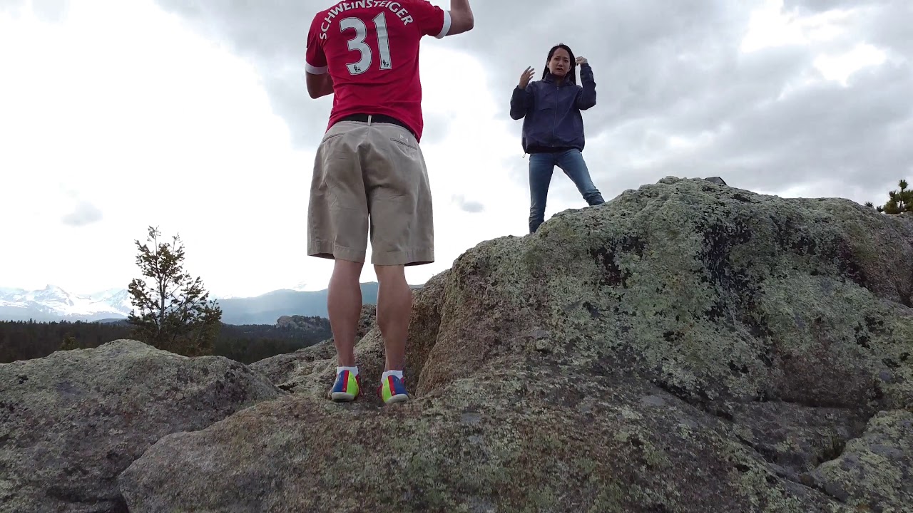 Vaulting Shot Over Rock Formation - YouTube