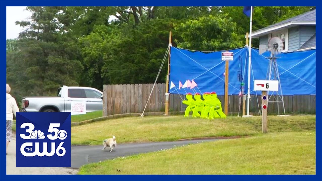 Worst Neighbor Ever? Neighbor feud escalates to man-made wall - YouTube