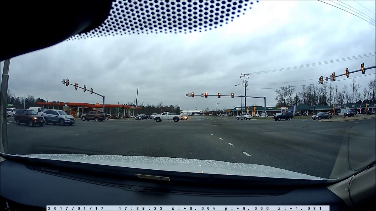 Close calls at red light - YouTube