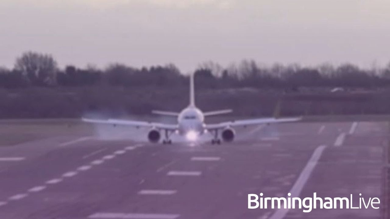 Planes struggle to land at Birmingham Airport during Storm Pia - YouTube