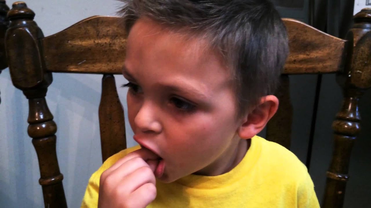 Loose tooth POP!!! - YouTube