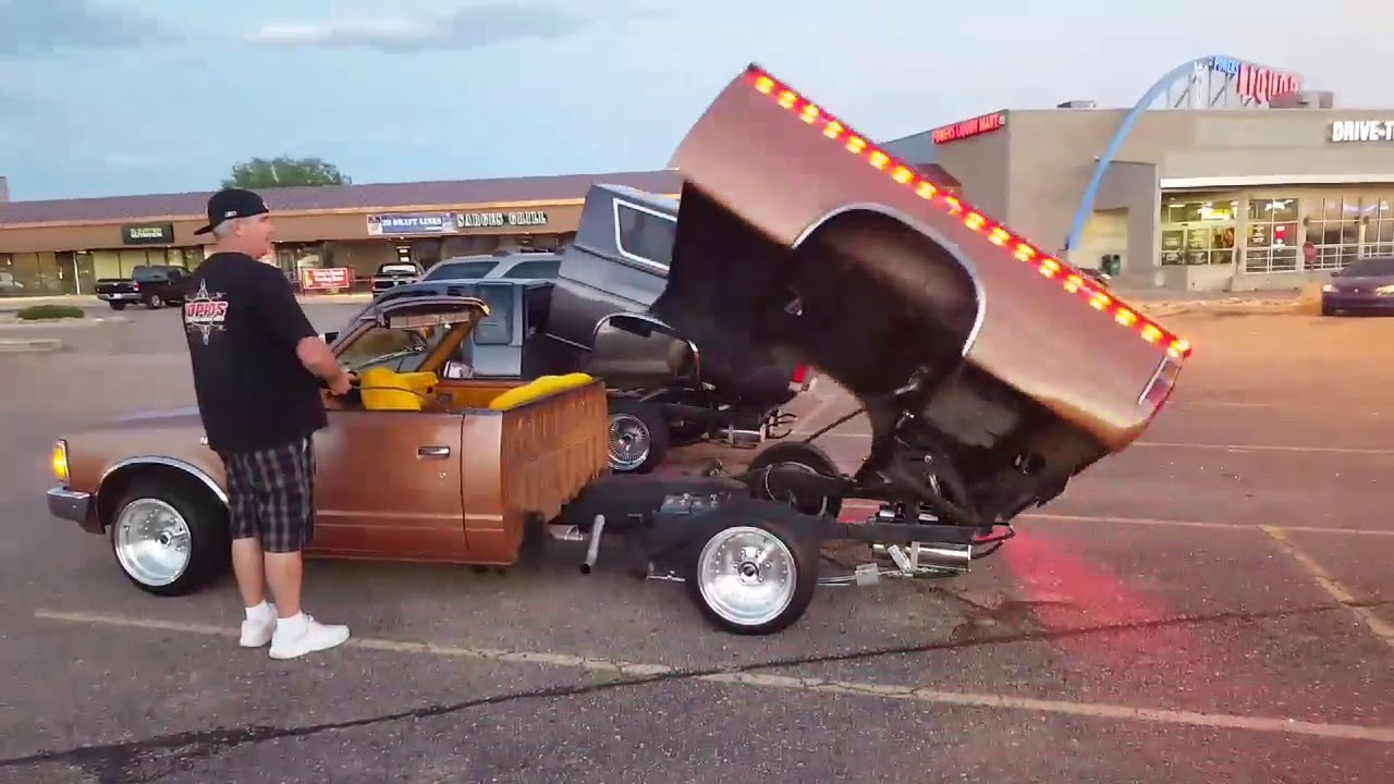 Hoppos equipped bed dancing nissan 720 hardbody tilt mini truck - YouTube