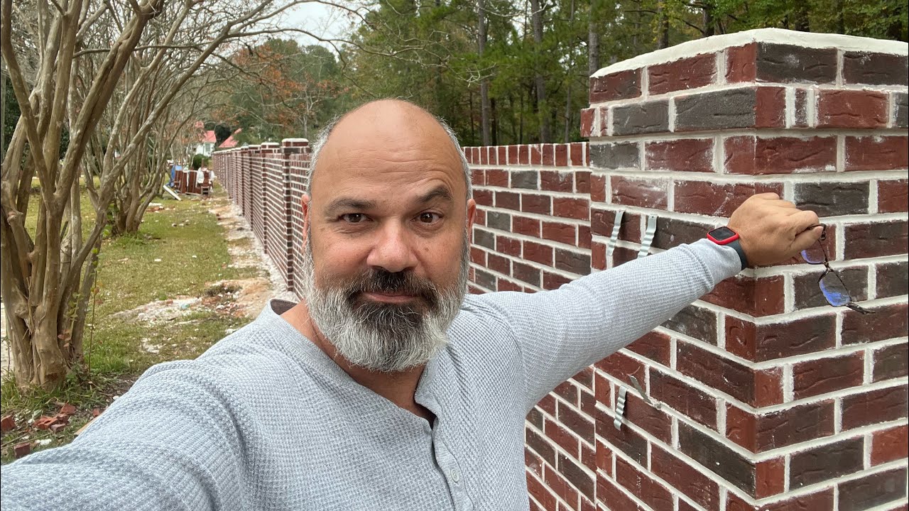 Building a brick wall around our property - YouTube