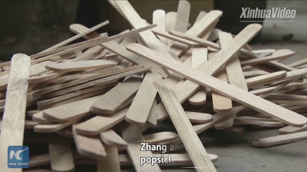 Trash to treasure! Chinese craftsman turns popsicle sticks into ...
