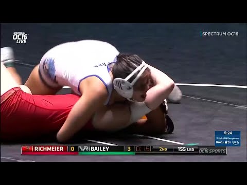 ‘We really worked hard’: Twin sisters top podium at state wrestling championships
