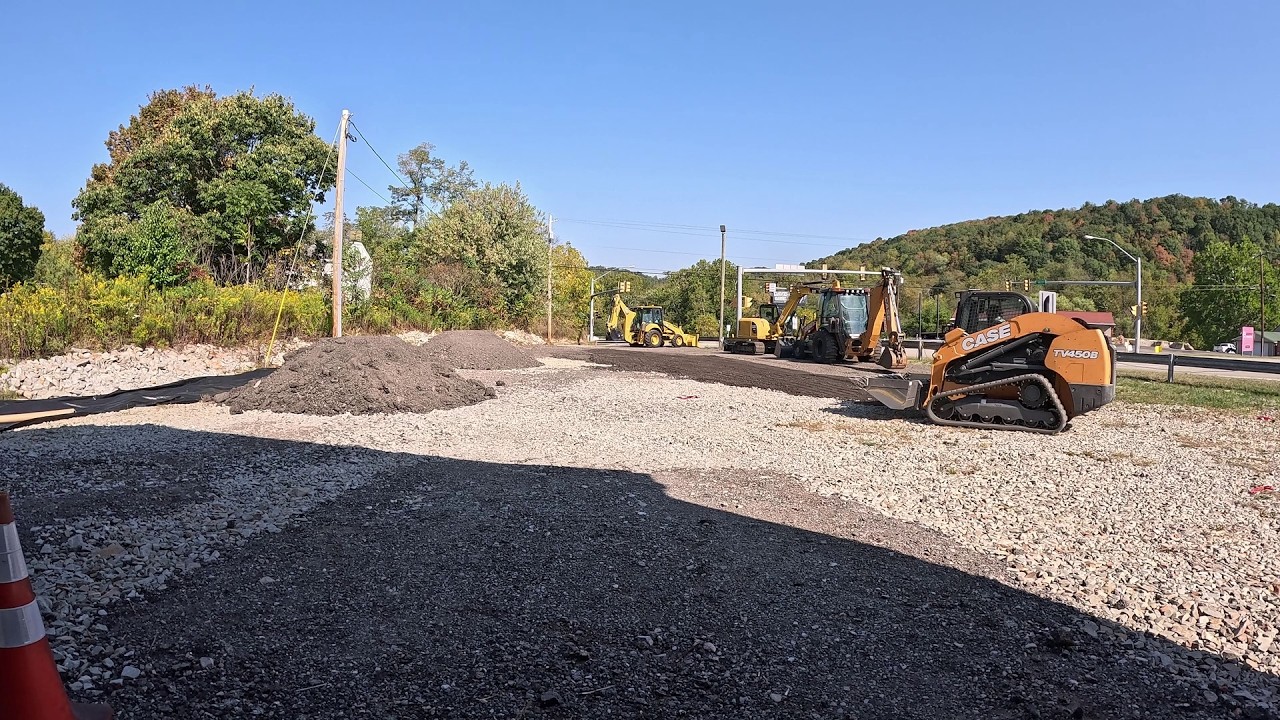 Putting Down Millings and Grading A Parking Lot - YouTube