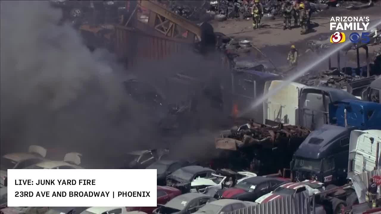 Raw video: Junk yard fire in southwest Phoenix sending thick black ...