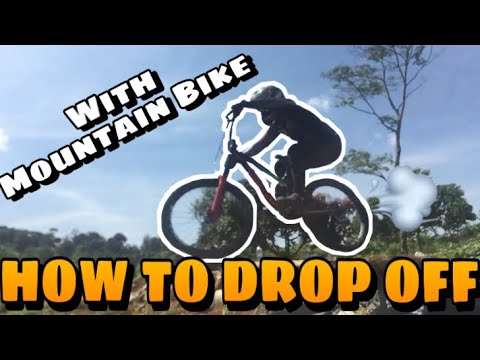 HOW TO DROP OFF ON MOUNTAIN BIKE - YouTube