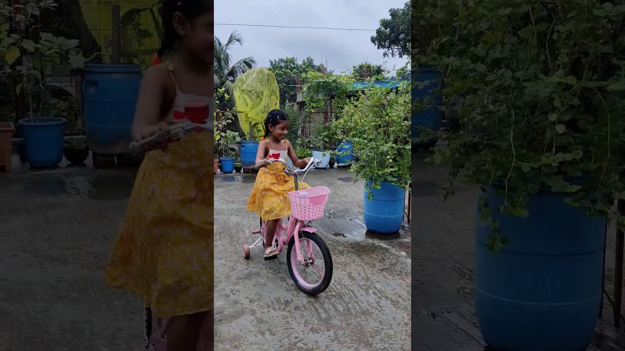 Rushda is riding a bicycle on the rooftop Garden. #kidsvideo #kids #kidsplay #ridingbicycle ...