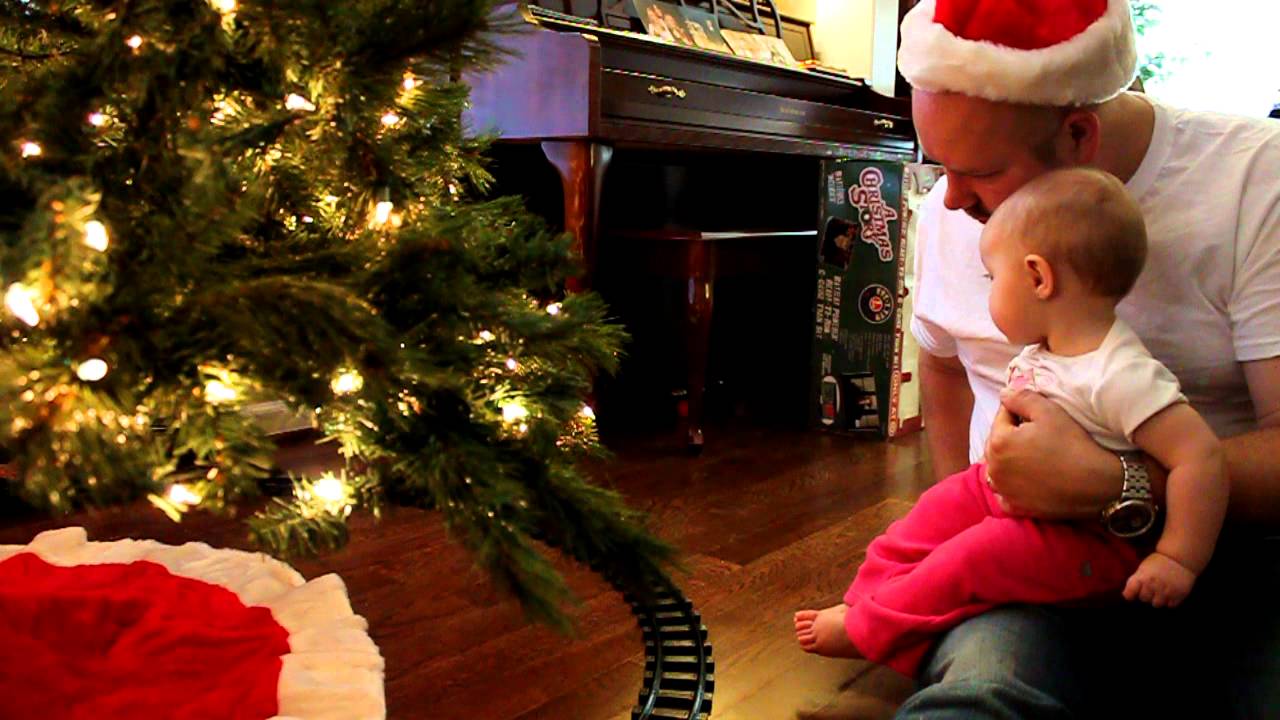 Christmas Morning watching the Train go around the Christmas Tree ...