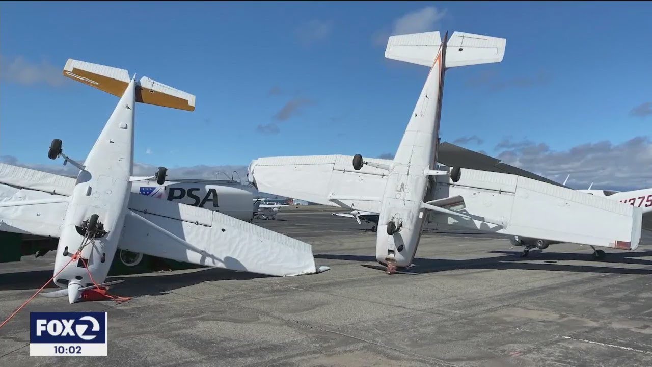 Strong wind flips three small planes in Concord - YouTube