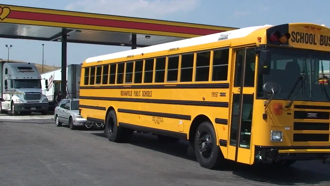 Brand New 2011 Thomas School Bus Pulling A Car - YouTube