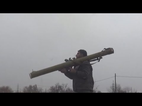 Syrian rebels using RPG-29 “Vampire" against the tank in the environs ...