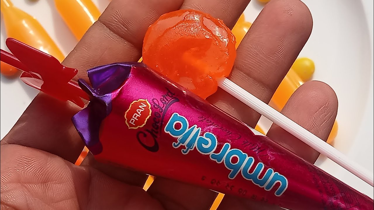 Umbrella chocolate and juicy lollipop candy lozenge / shimu soha ltd ...