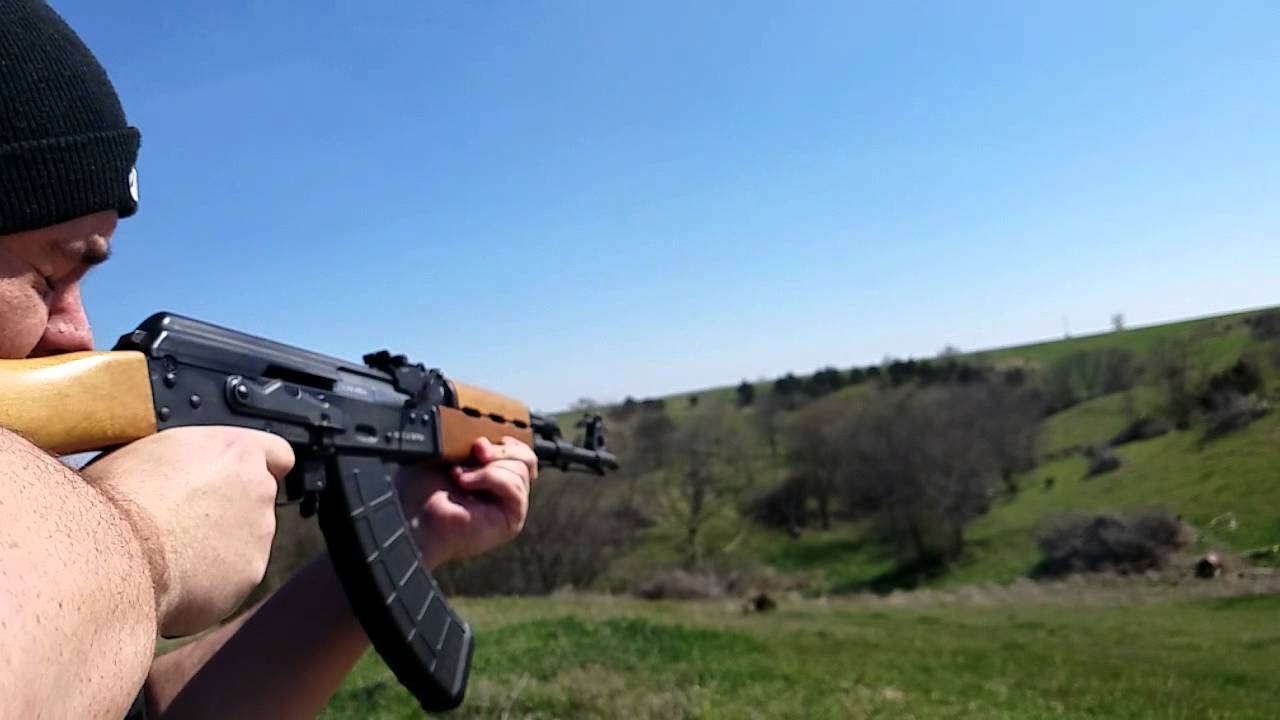 Slow-mo semi auto AK firing - YouTube