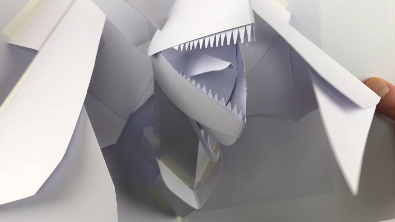 Pop-up dragon with expanding wing mechanisms (first try) - YouTube