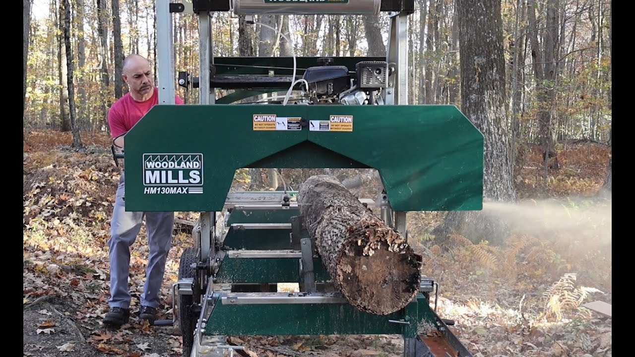 Cutting a log to test the new clutch on the Woodland Mills HM130max ...