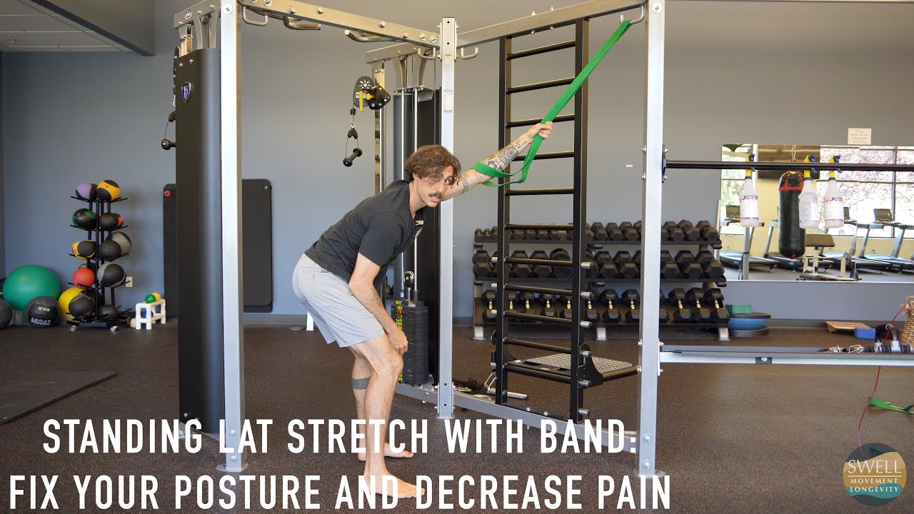 Standing Lat Stretch with Band: Fix Your Posture and Decrease Pain ...