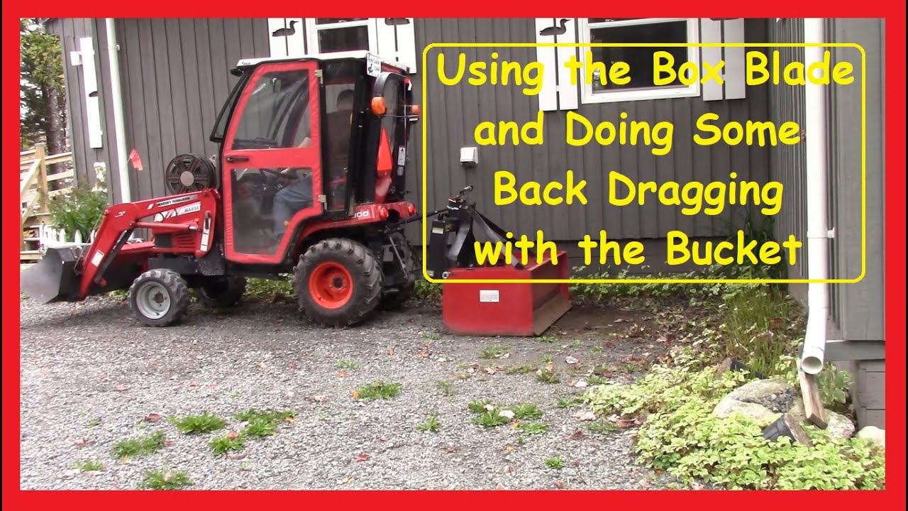 Using the Box Blade and Doing Some Back Dragging with the Bucket - YouTube
