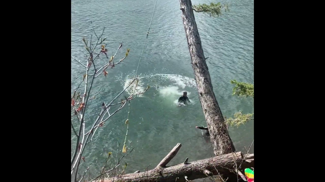 Rope swing cliff lake - YouTube