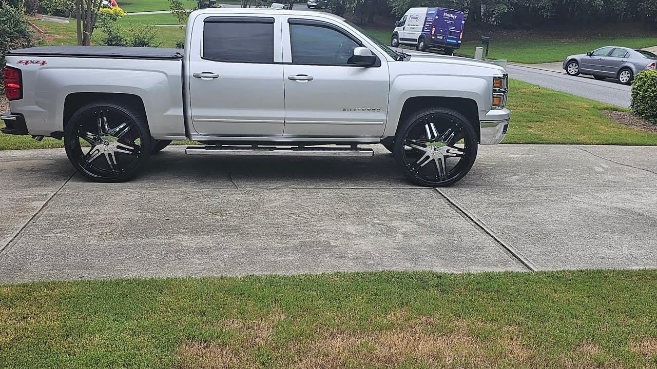 Putting 30 inch Diablo rims on my 2015 Chevy Silverado Lt. - YouTube