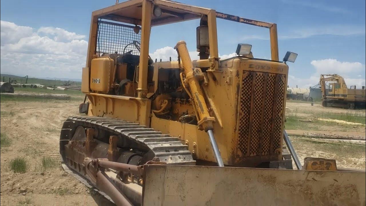 How to operate a Komatsu D60 bulldozer crawler info. Cummins power - YouTube