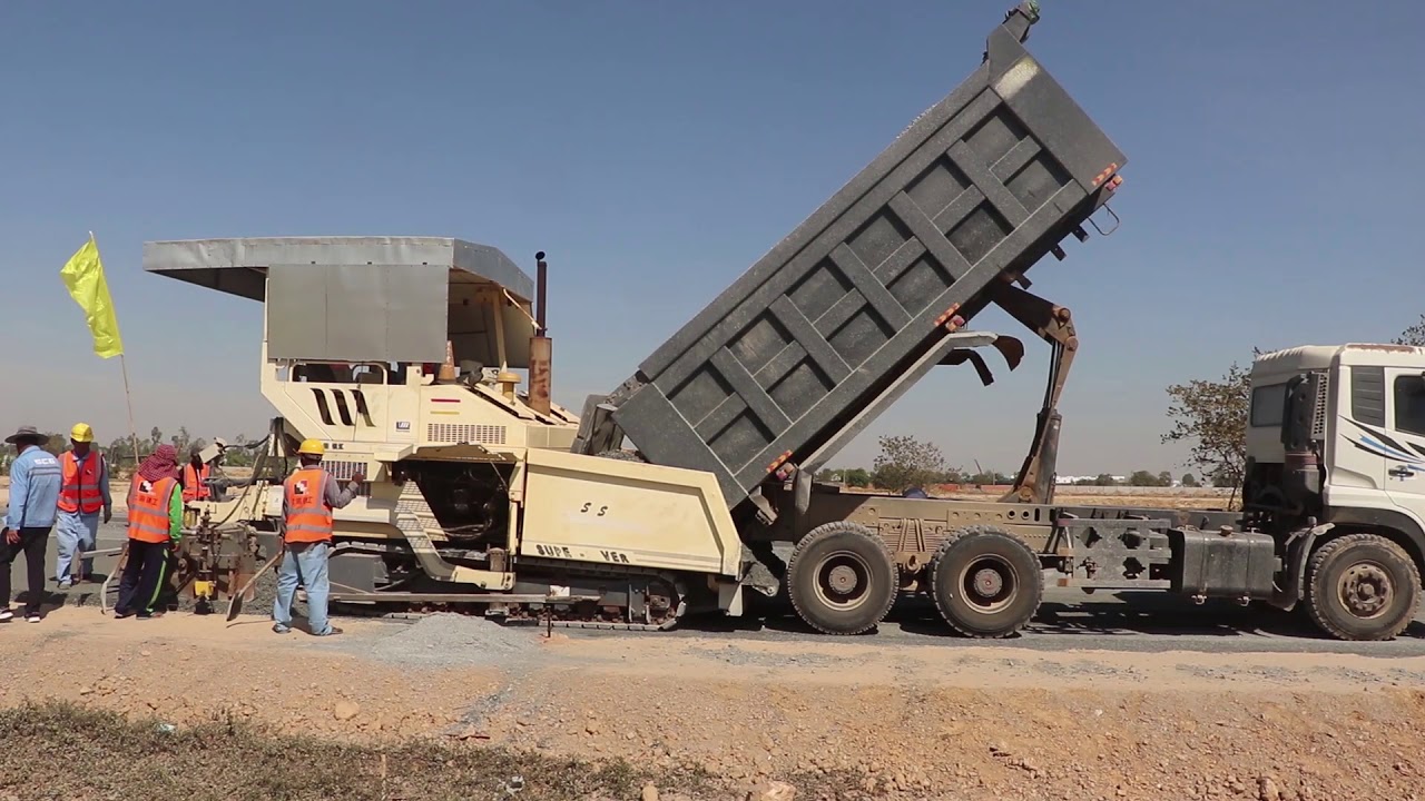 Awesome road construction machinery operator Asphalt paver, Vibratory ...