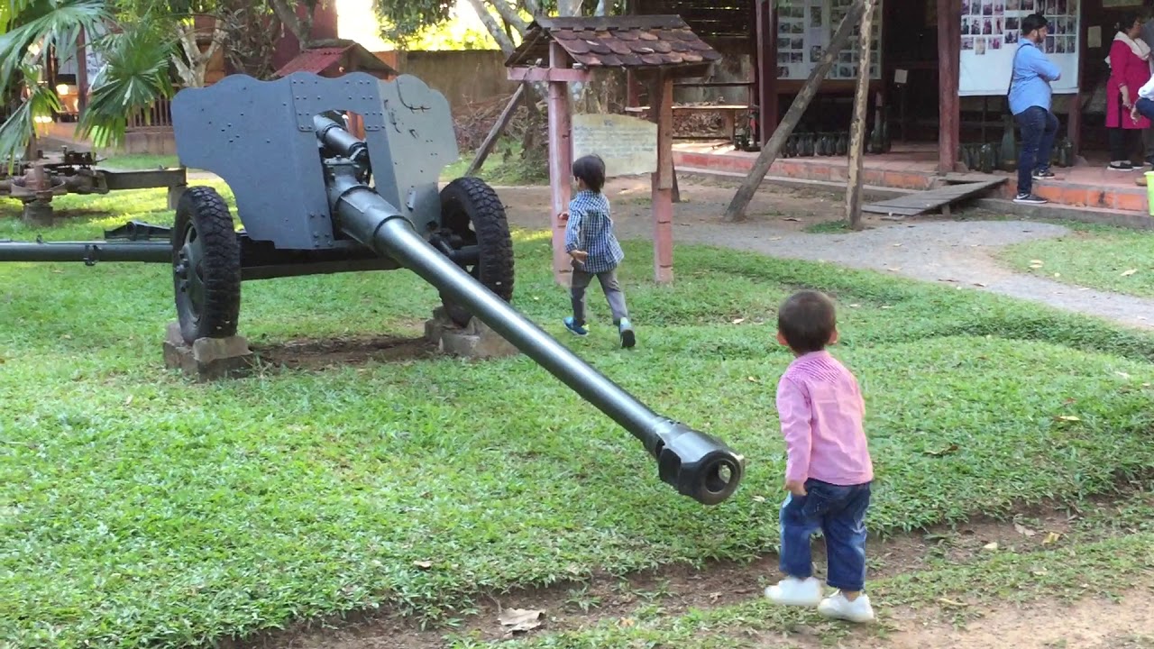 two kids playing around war museum ,real toys gun with kids - YouTube