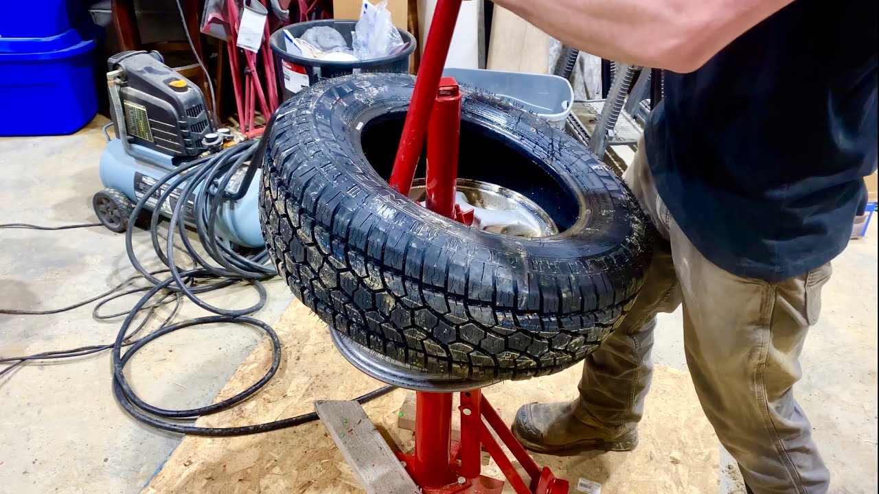 Changing A Car Tire By Hand - YouTube