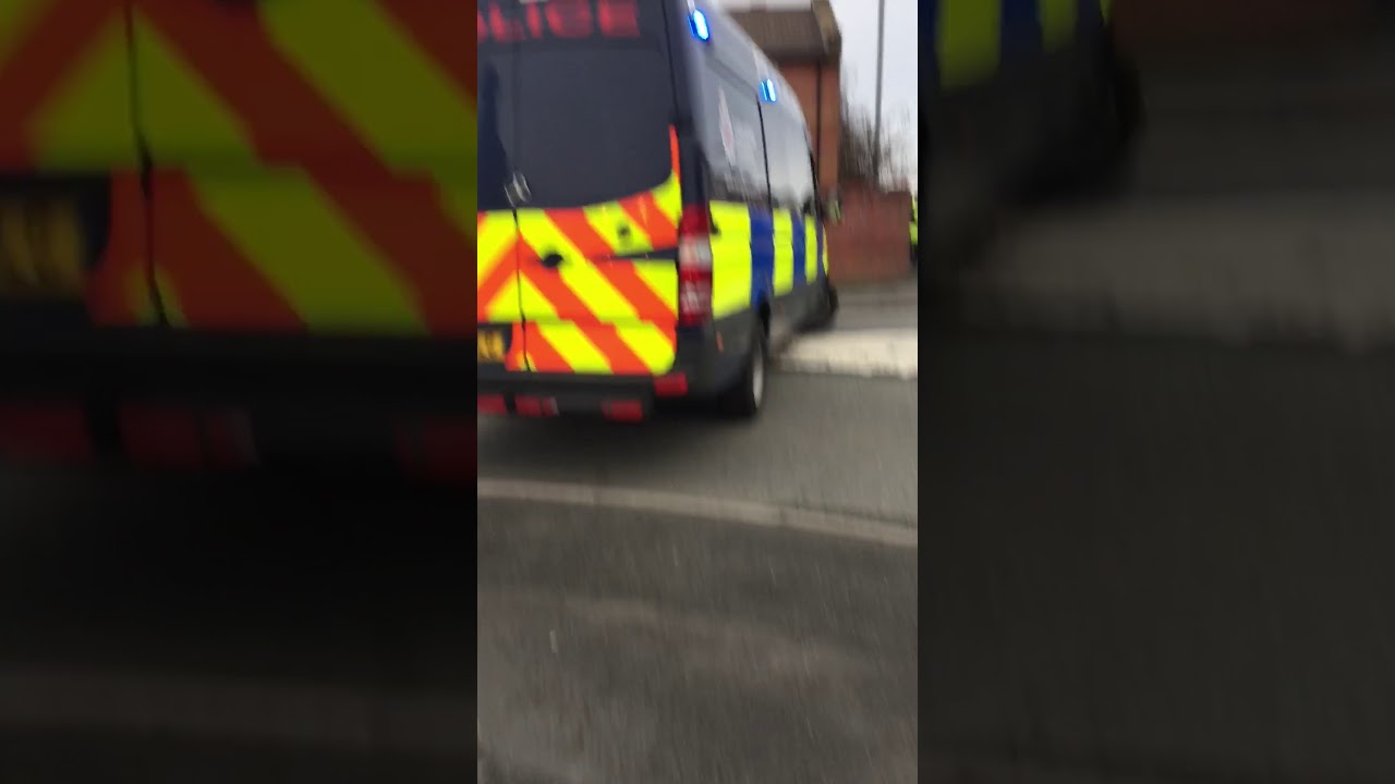 Leeds United hooligans getting a police escort through Preston (fight ...