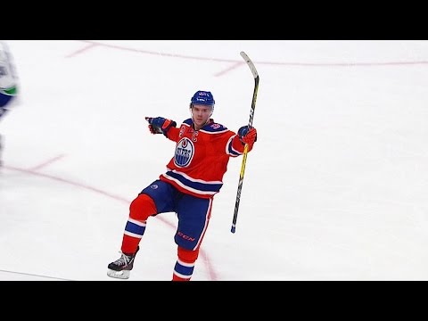 Sekera drops off puck for McDavid to rifle home for goal