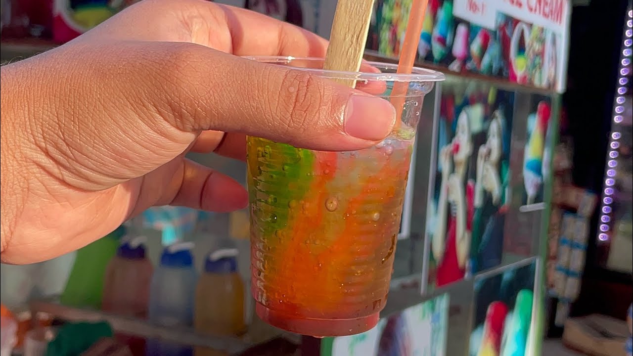 Bangladeshi most famous colourfull ice golla on street side ...