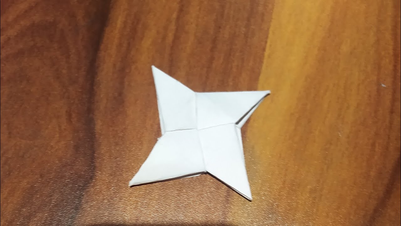 How to make a. very easy ninja star from a square paper - YouTube