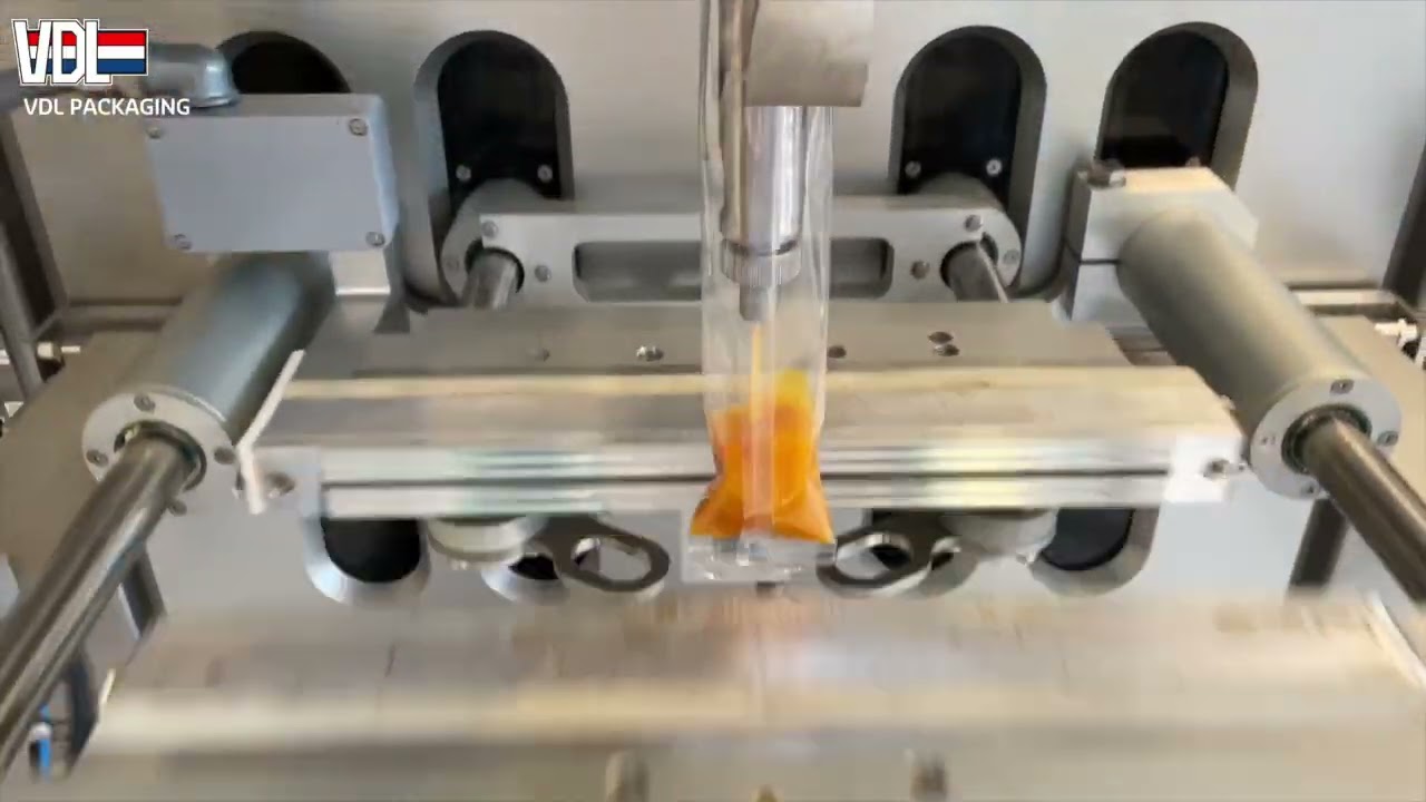 VDL Packaging test for packing liquids chili and mango sauce - YouTube