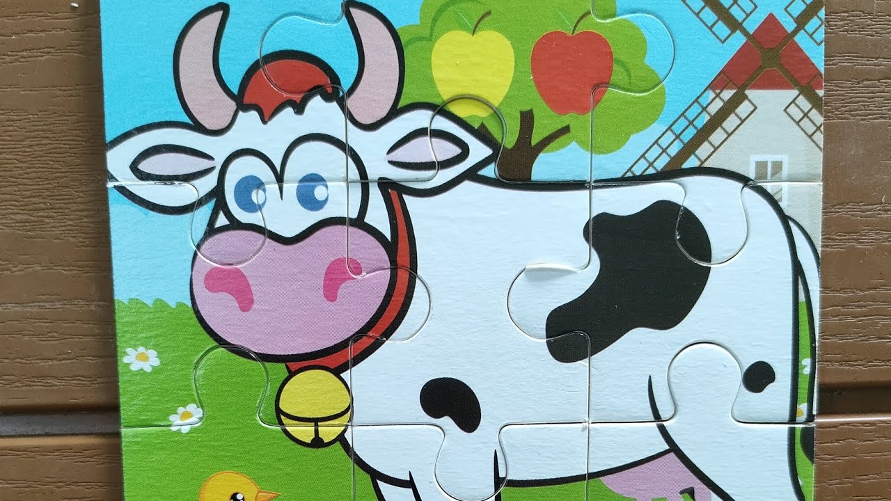 Menyusun puzzle bergambar sapi🐄🐄 Put together a puzzle with a picture ...