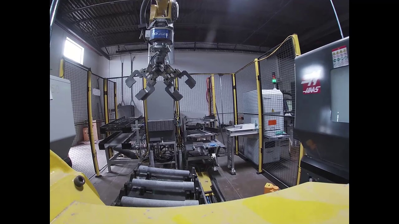 FANUC Robot On Track Tending Machines - YouTube