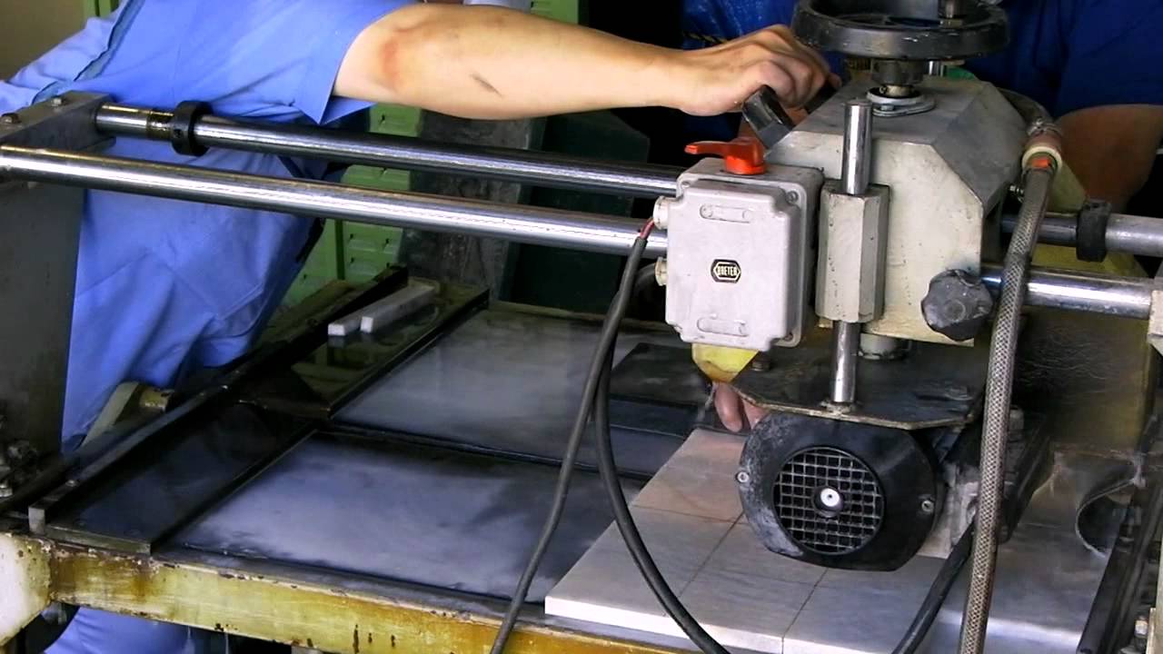 Marble tile cutting by diamond tile cutter - YouTube