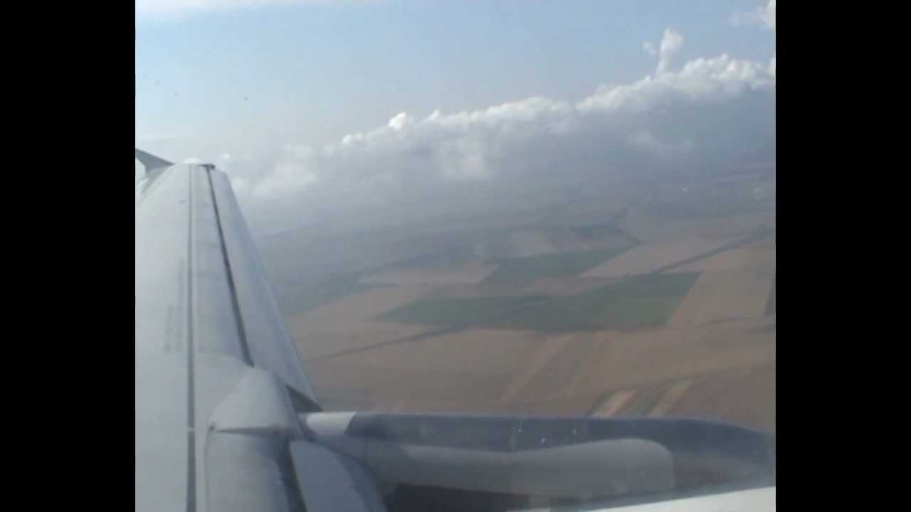 Air France Airbus A318 landing at Paris Charles de Gaulle Intl. runway ...