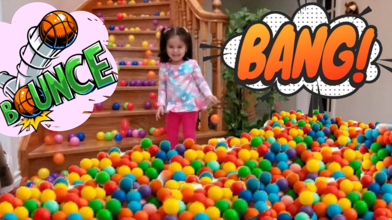 SURPRISE GIANT BALL PIT FUN WITH MAYA | Colorful balls bouncing down ...