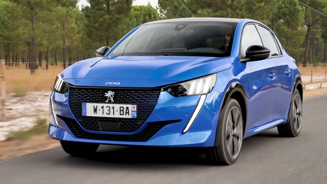 The new Peugeot e-208 GT in Vertigo Blue Driving Video - YouTube