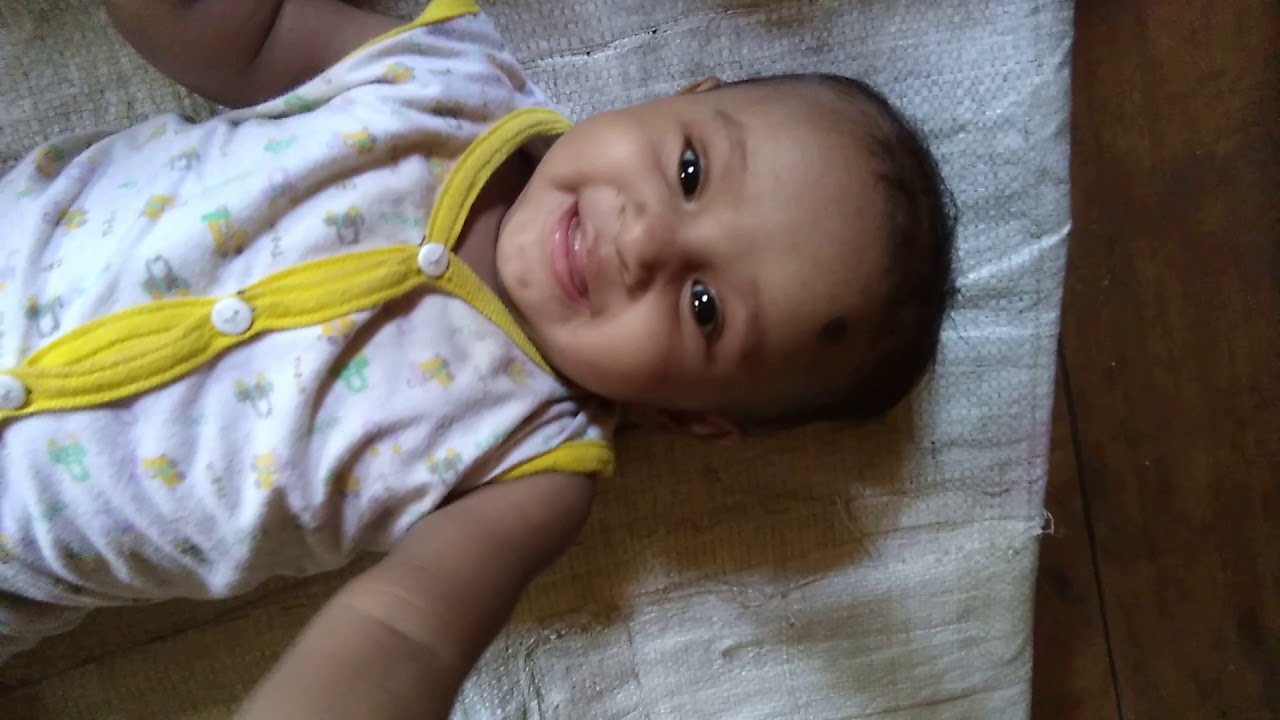 a baby first moments with smile - YouTube