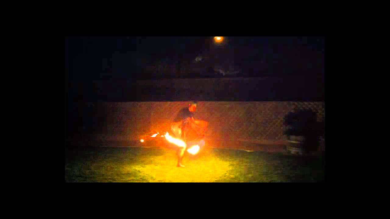 Ashley Michaud fire spinning to Inspector Gadget remix - YouTube