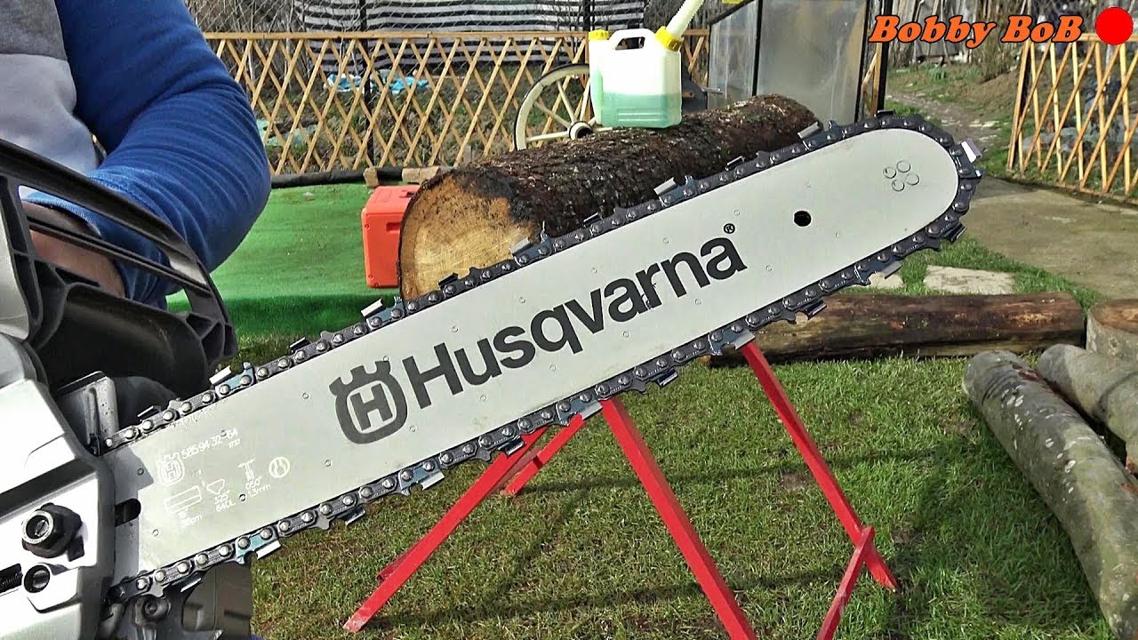 Husqvarna 550 XP cu lant tip dalta si benzina 98 - YouTube