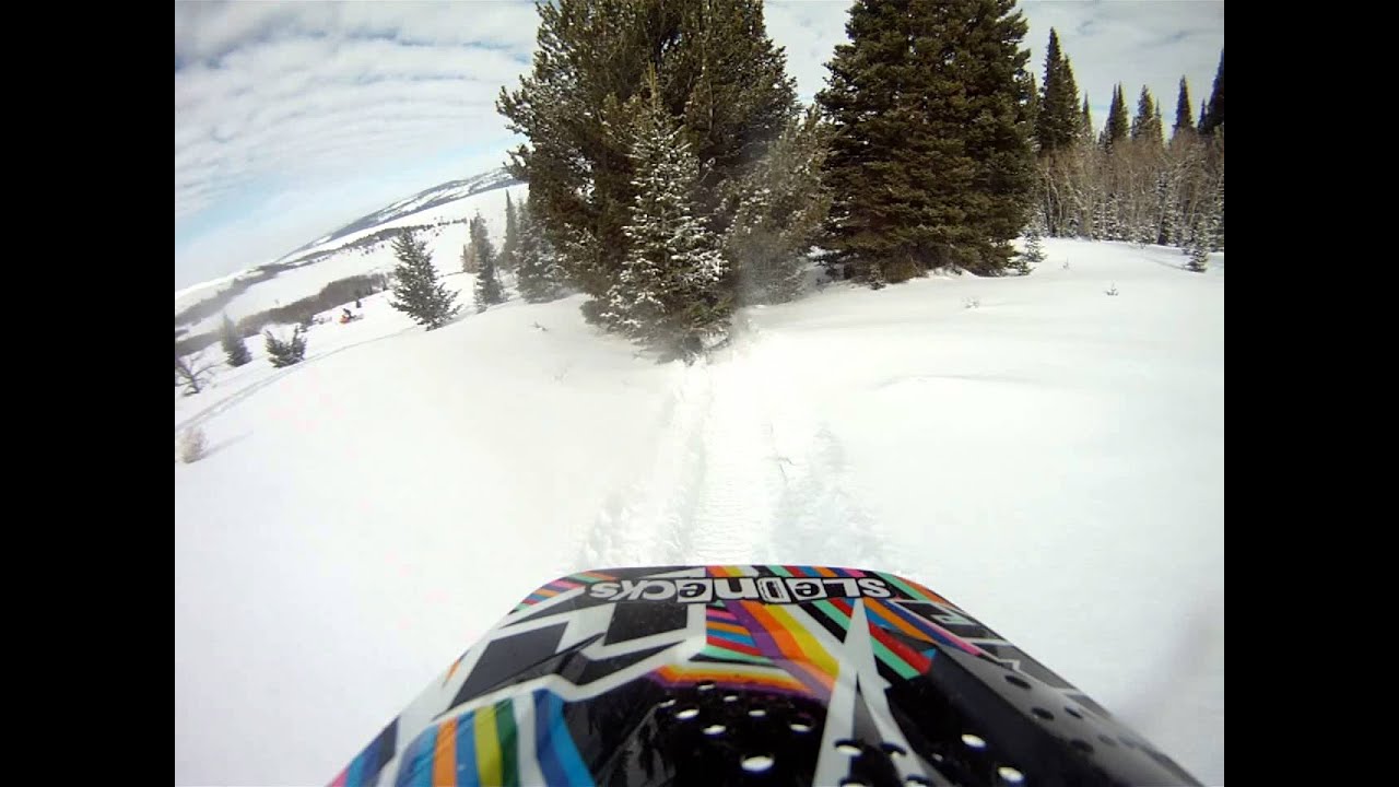 Snowmobile crash into tree - YouTube