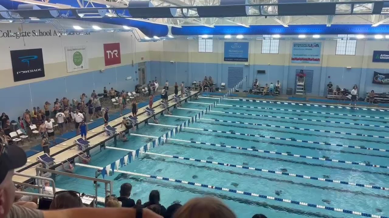 Quest, Monacan swimmer Emerson Callis (lane 4) swims the 100 free at ...